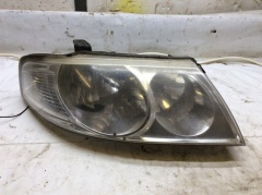 Купить Стекло передней правой фары 2601095F0B для Nissan Almera Classic ...